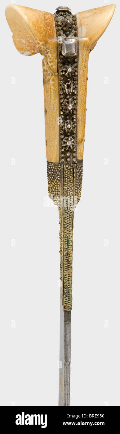 A silver-mounted Ottoman yatagan, dated 1812 Typically curved blade ...