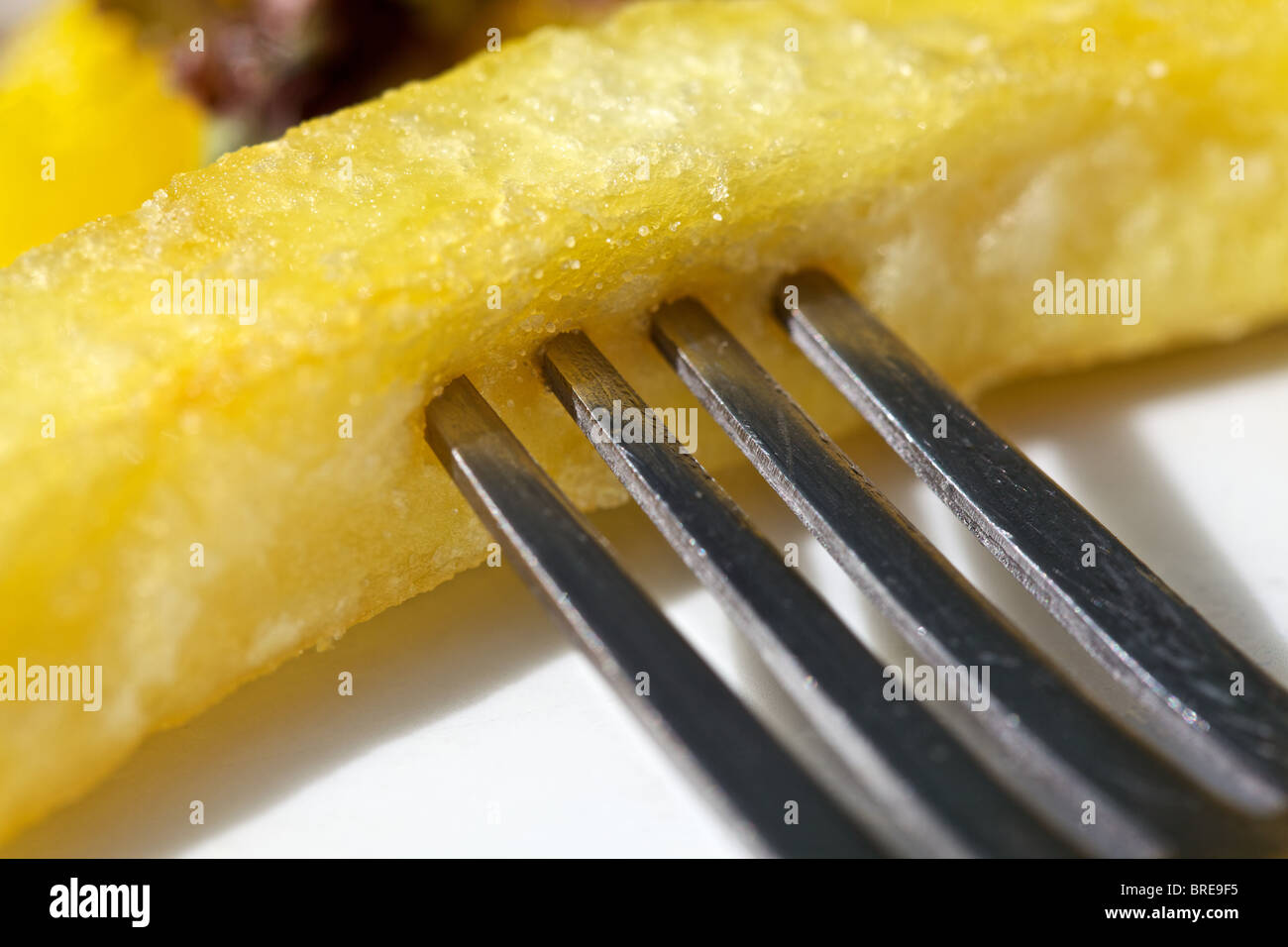 chip on a fork Stock Photo - Alamy