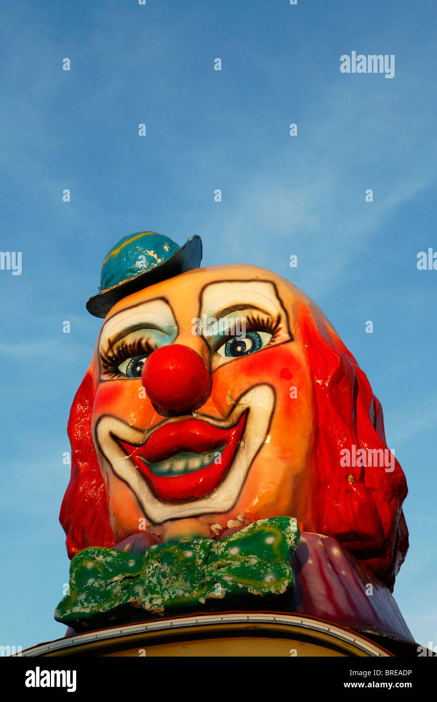 A clown's face under a blue sky Stock Photo - Alamy