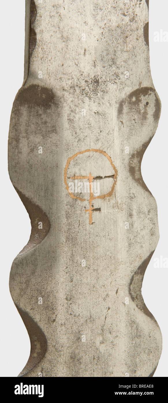 A German two-handed sword, middle of the 16th century Double-edged wavy ...