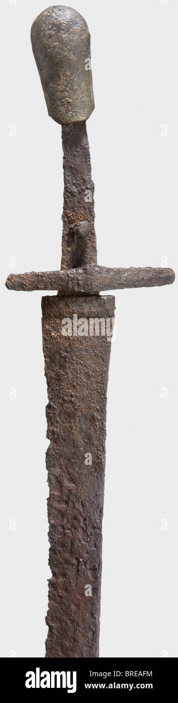 An Avar sword with a bronze pommel, Hungary, 7th/8th century A straight ...