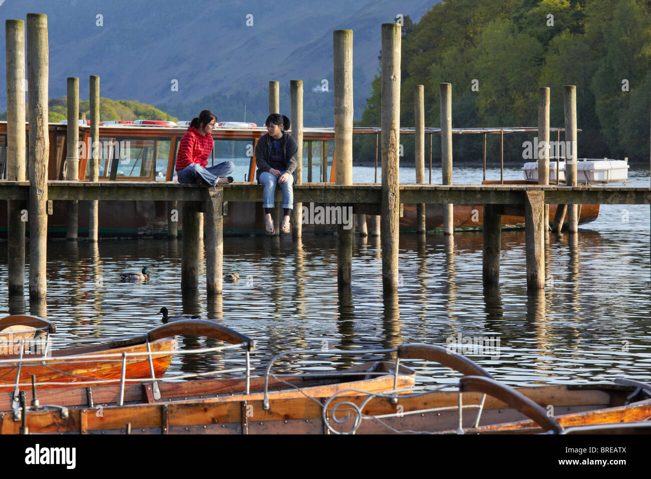 Two girls boat rowing hi-res stock photography and images - Alamy