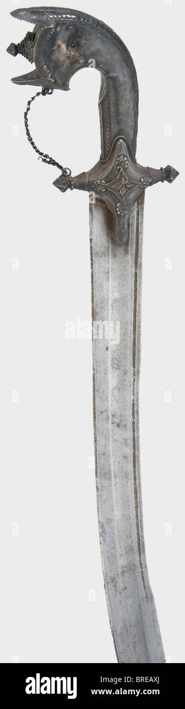 A silver-mounted saif, Arabian Peninsula, 19th century Broad, slightly ...