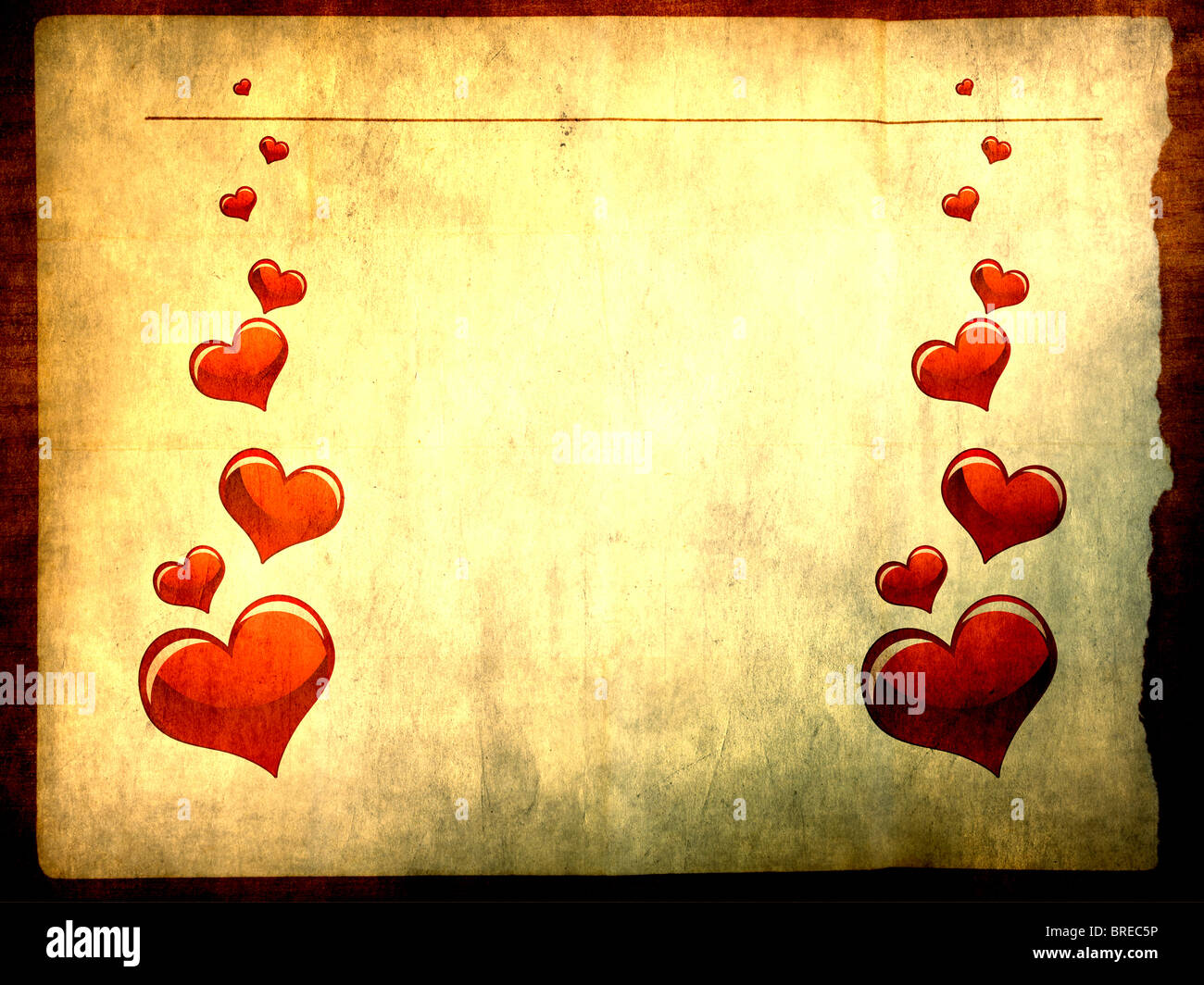 Various size heart shapes on paper background Stock Photo - Alamy