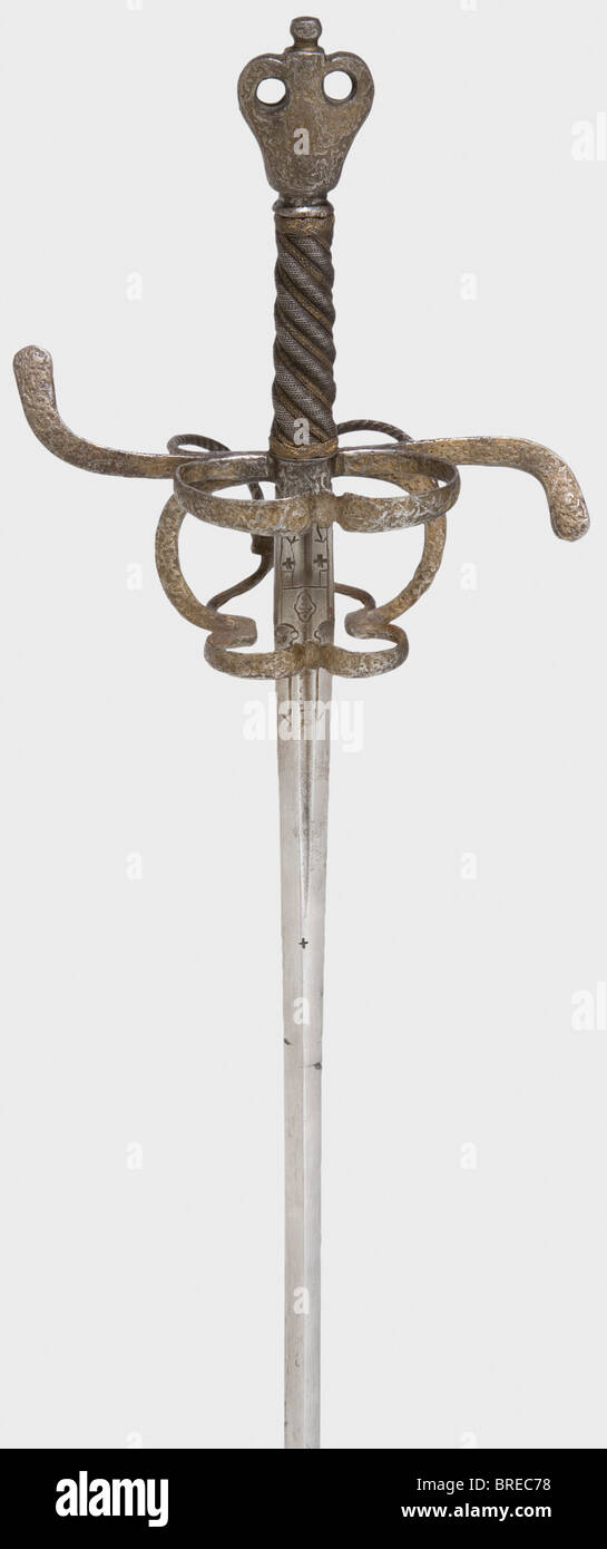 An Italian rapier with an etched hilt, circa 1600. Slender thrusting ...