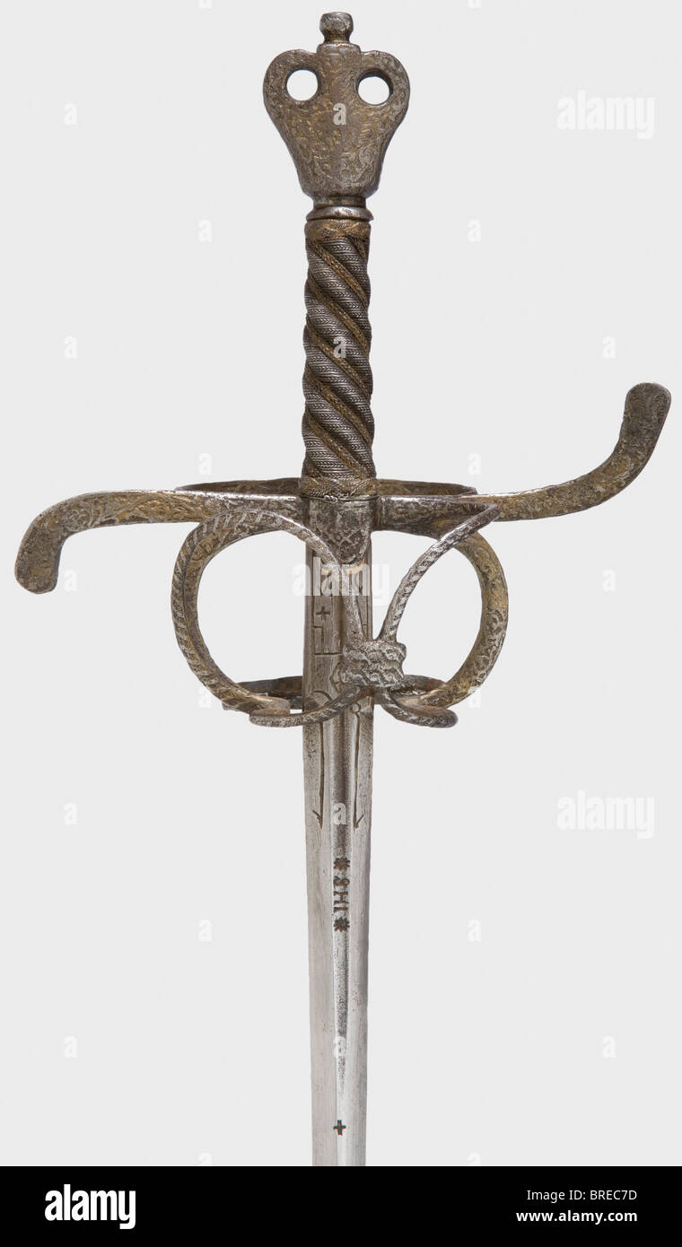 An Italian rapier with an etched hilt, circa 1600. Slender thrusting ...