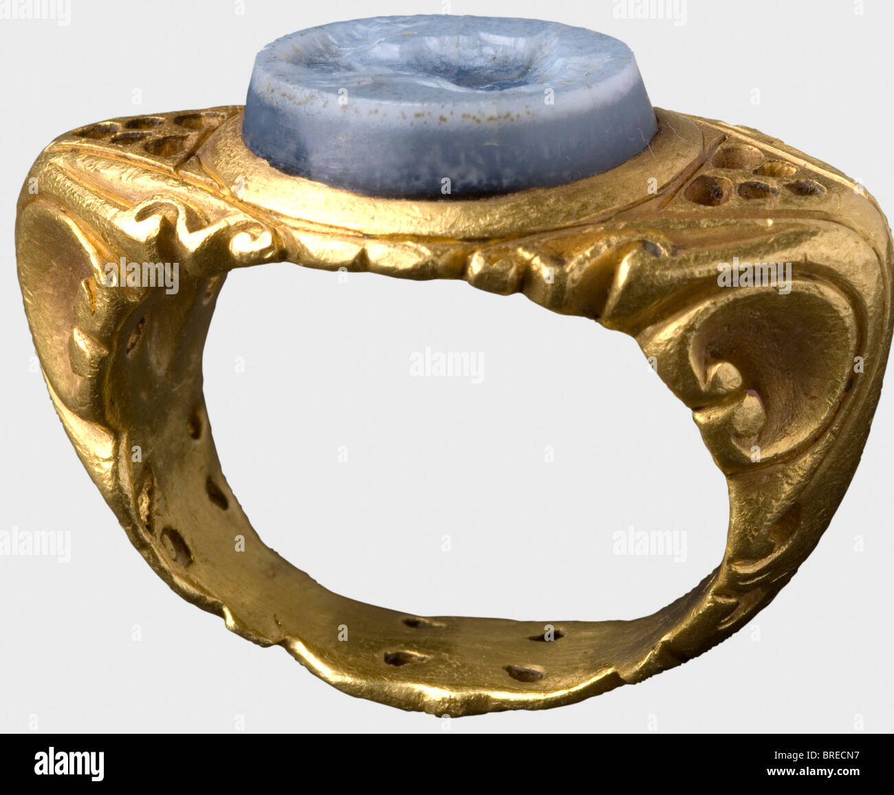 A Roman gold ring with an agate gem, 3rd/4th century A.D. Heavy band ...