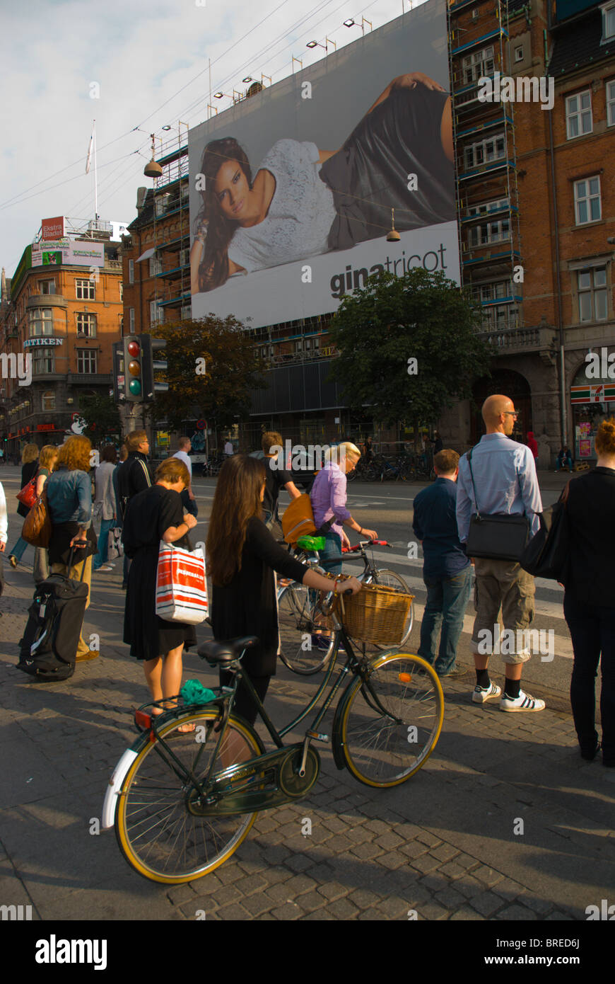People waiting to cross traffic lights central Copenhagen Denmark ...