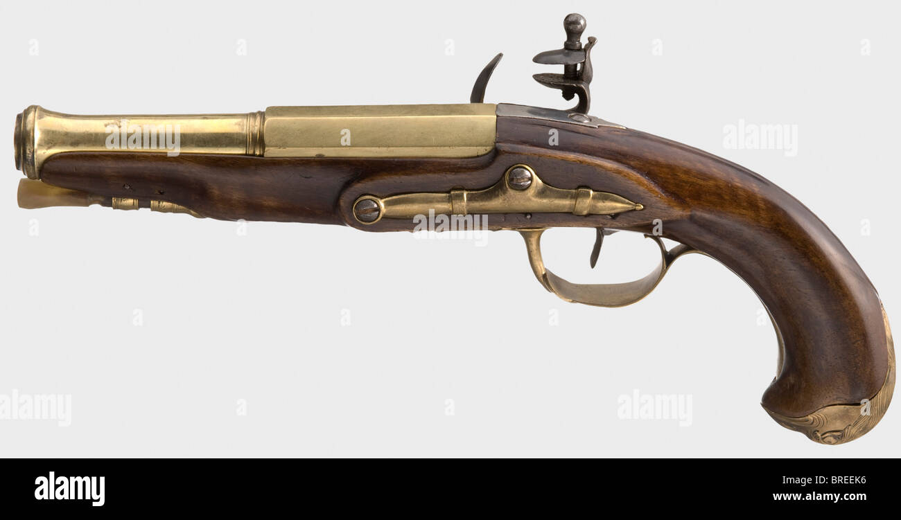 A fine pair of flintlock pistols with brass barrels, Cassaignard ...