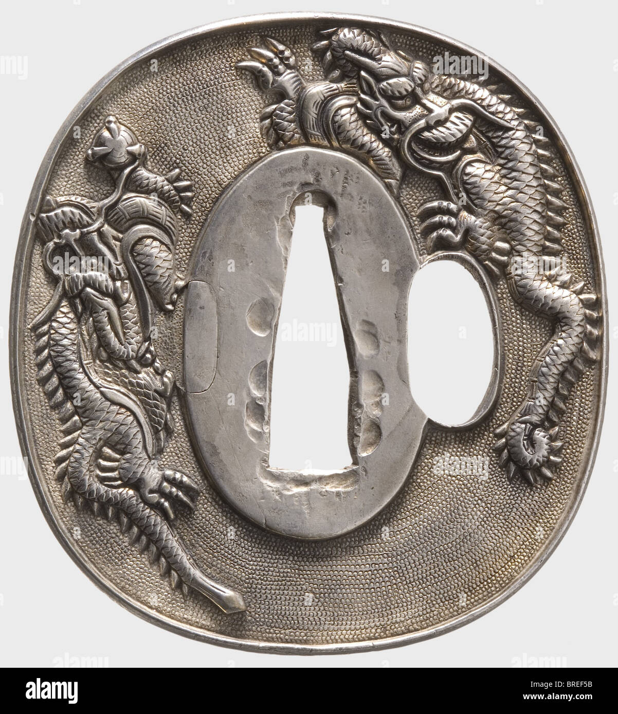 A silver tsuba, Japan, Muromachi period (ca. 1500) Ko-kinko or ko-goto ...