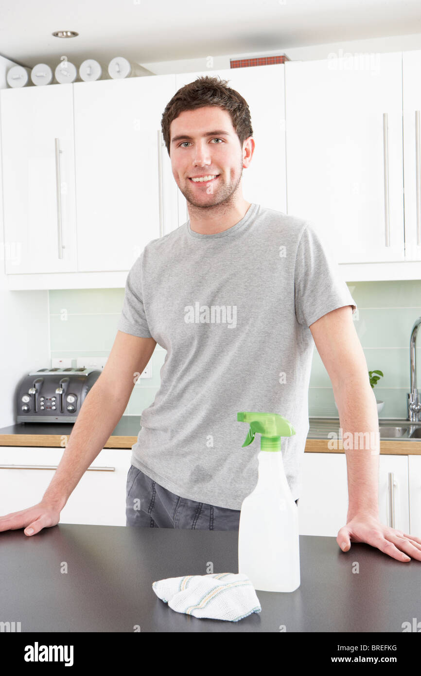 Young Man Cleaning Modern Kitchen Stock Photo - Alamy