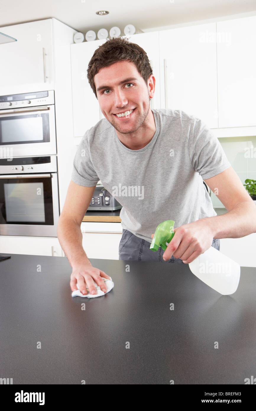 Young Man Cleaning Modern Kitchen Stock Photo - Alamy