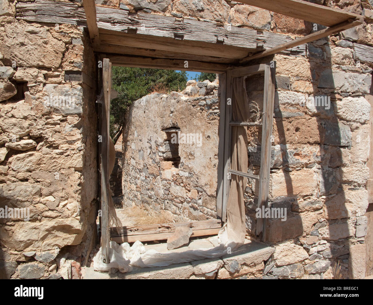 Wrecked house with broken window Stock Photo - Alamy