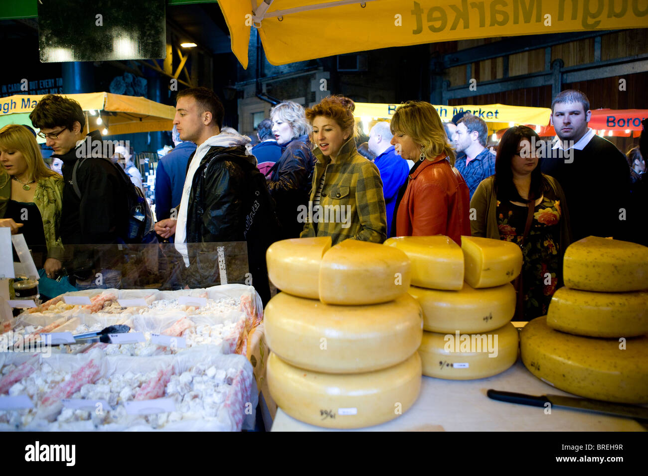Customers buying cheese at Borough Market, south London Stock Photo - Alamy