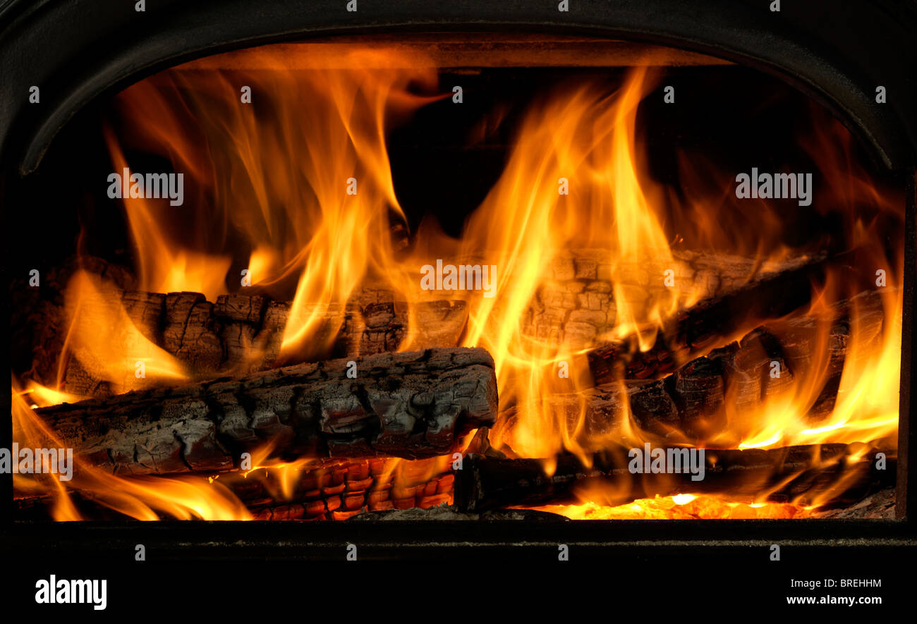 Close Up Of Flaming Logs On Fire Stock Photo - Alamy