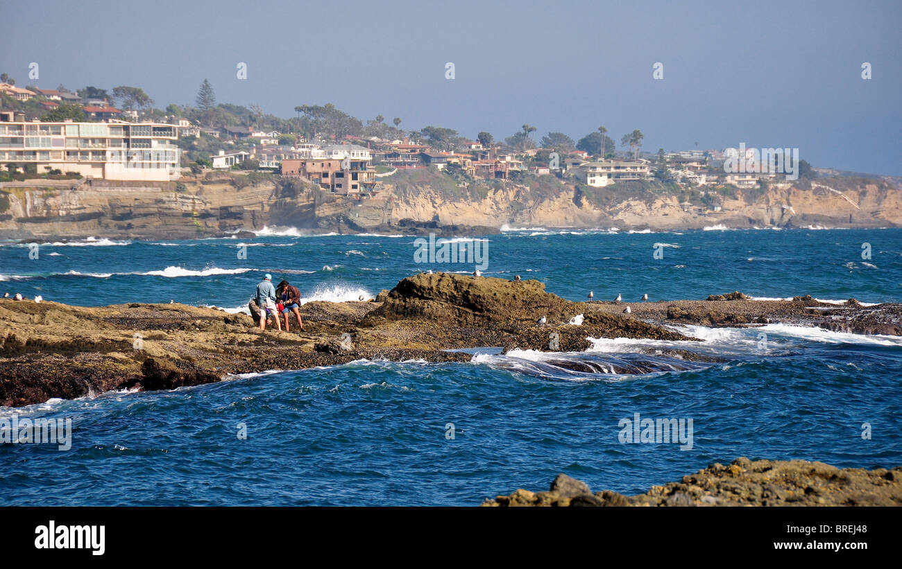 People exploring tidepools in Laguna Beach, California Stock Photo - Alamy