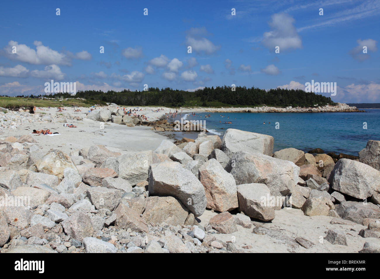 relaxing on the rocky beach of Crystal Crescent Beach, Halifax, Nova ...
