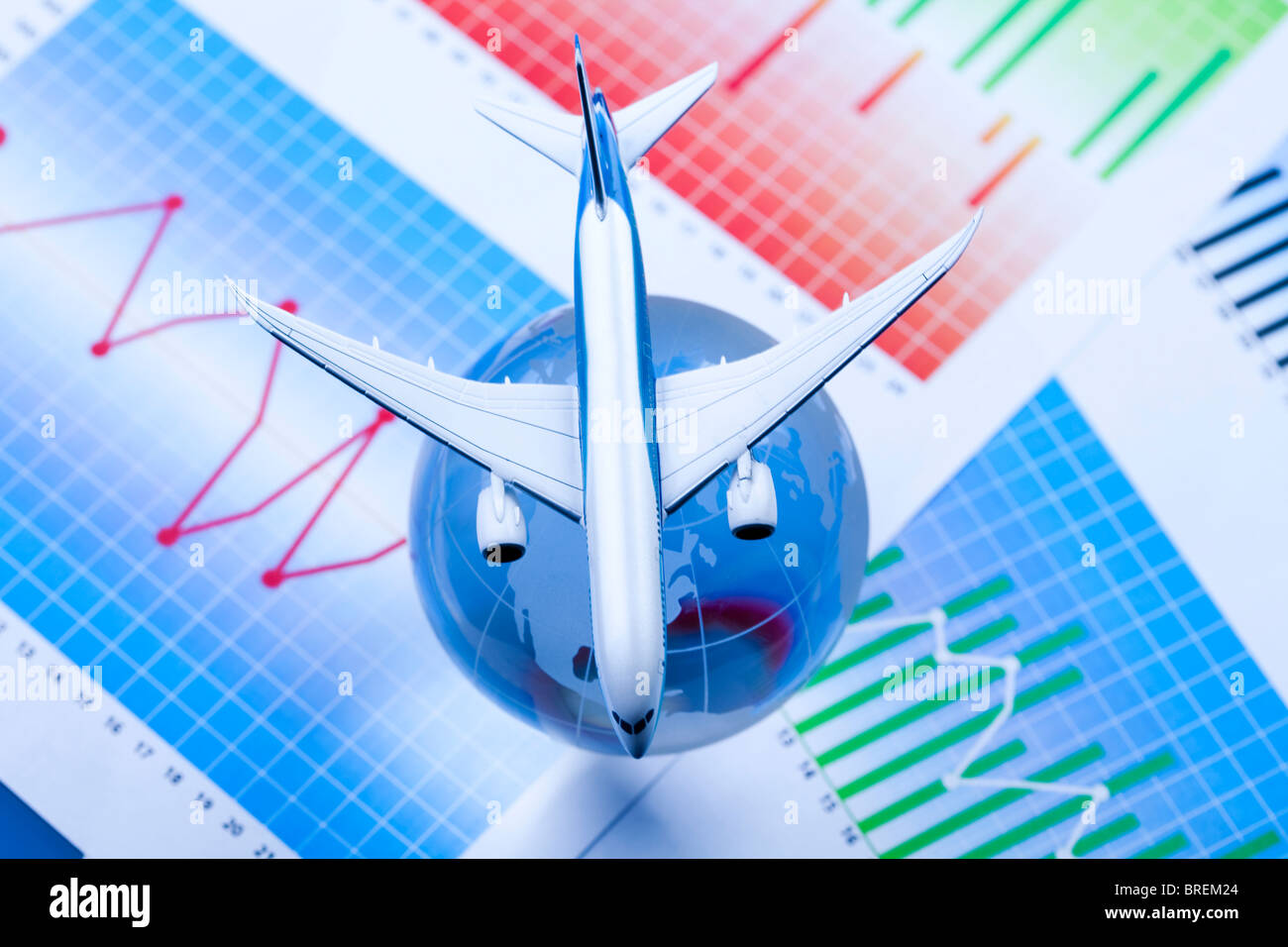 Airplane in finance and world Stock Photo - Alamy