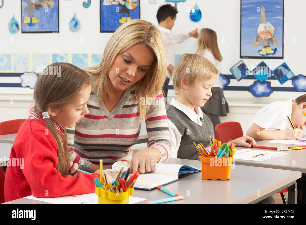 Child teacher reading classroom hi-res stock photography and images - Alamy