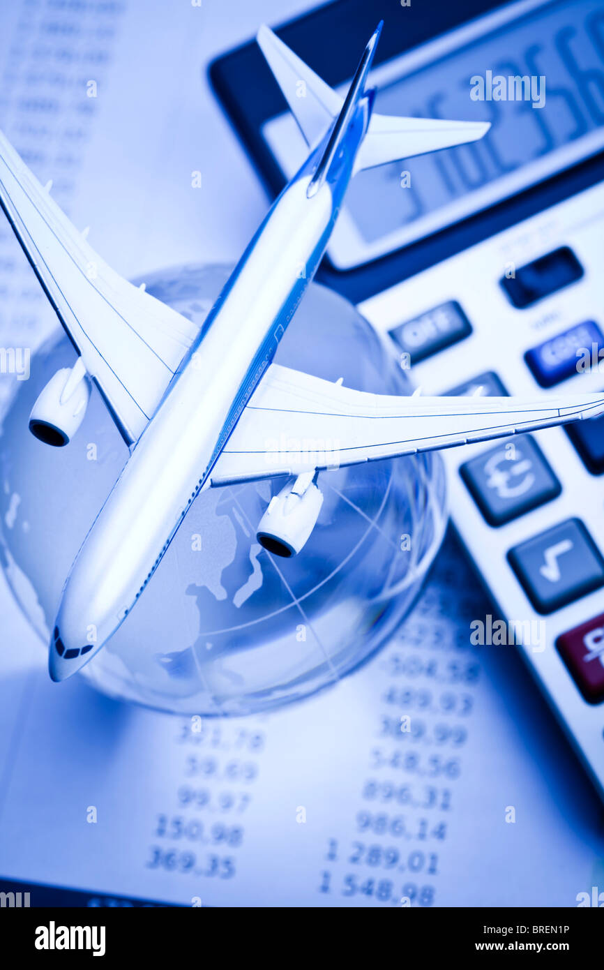 Airplane in finance and world Stock Photo - Alamy