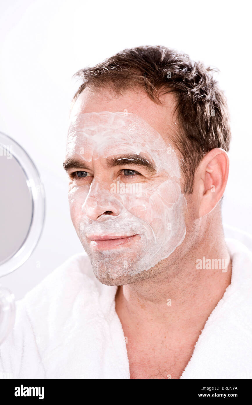 Man, lotion on his face Stock Photo - Alamy