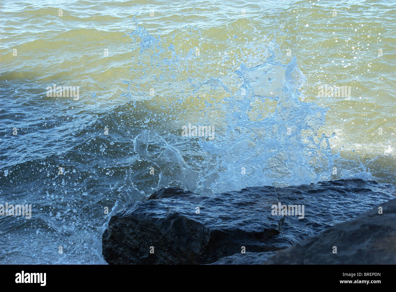 Lake Ontario waves break over rocks Stock Photo - Alamy