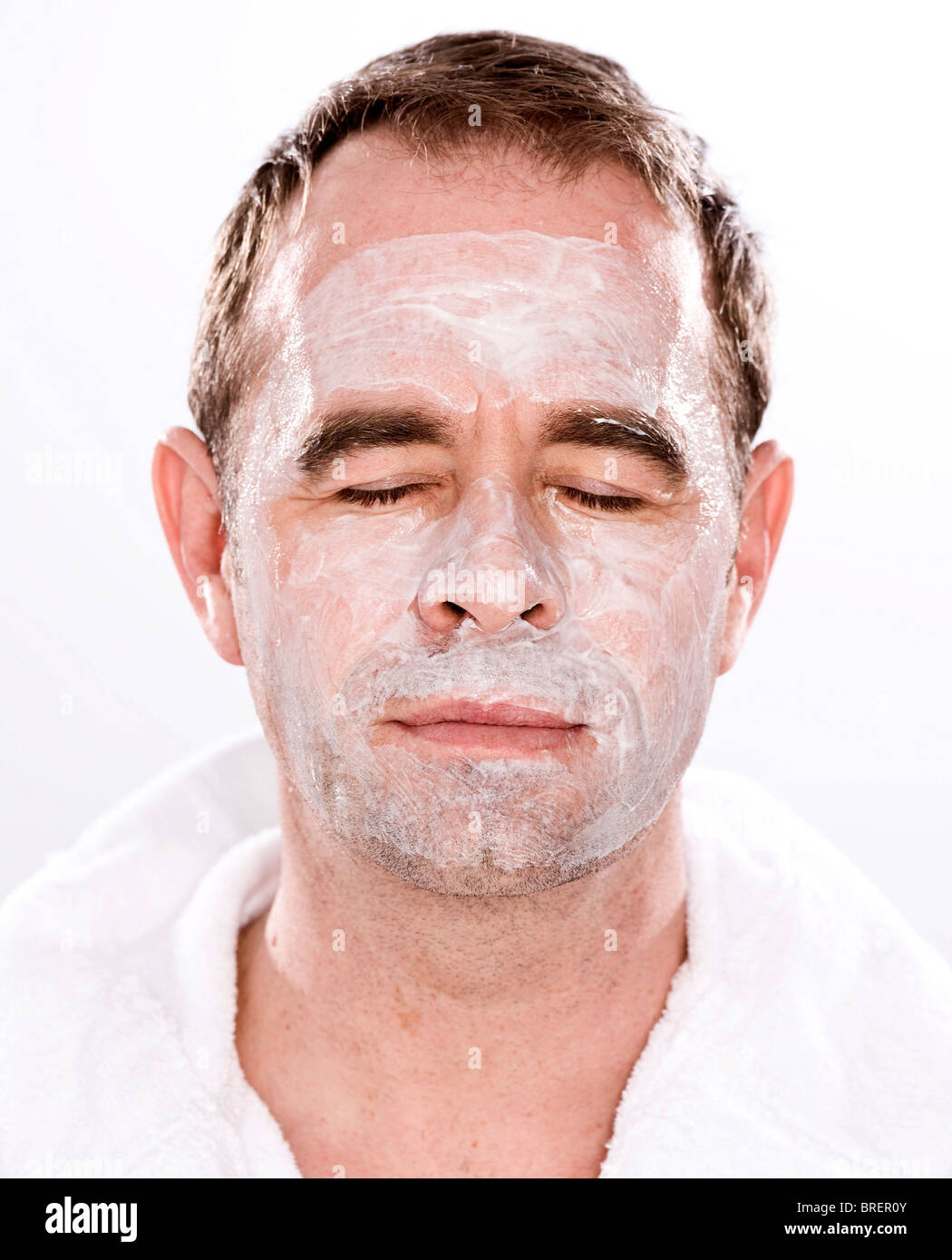 Man, lotion on his face Stock Photo - Alamy