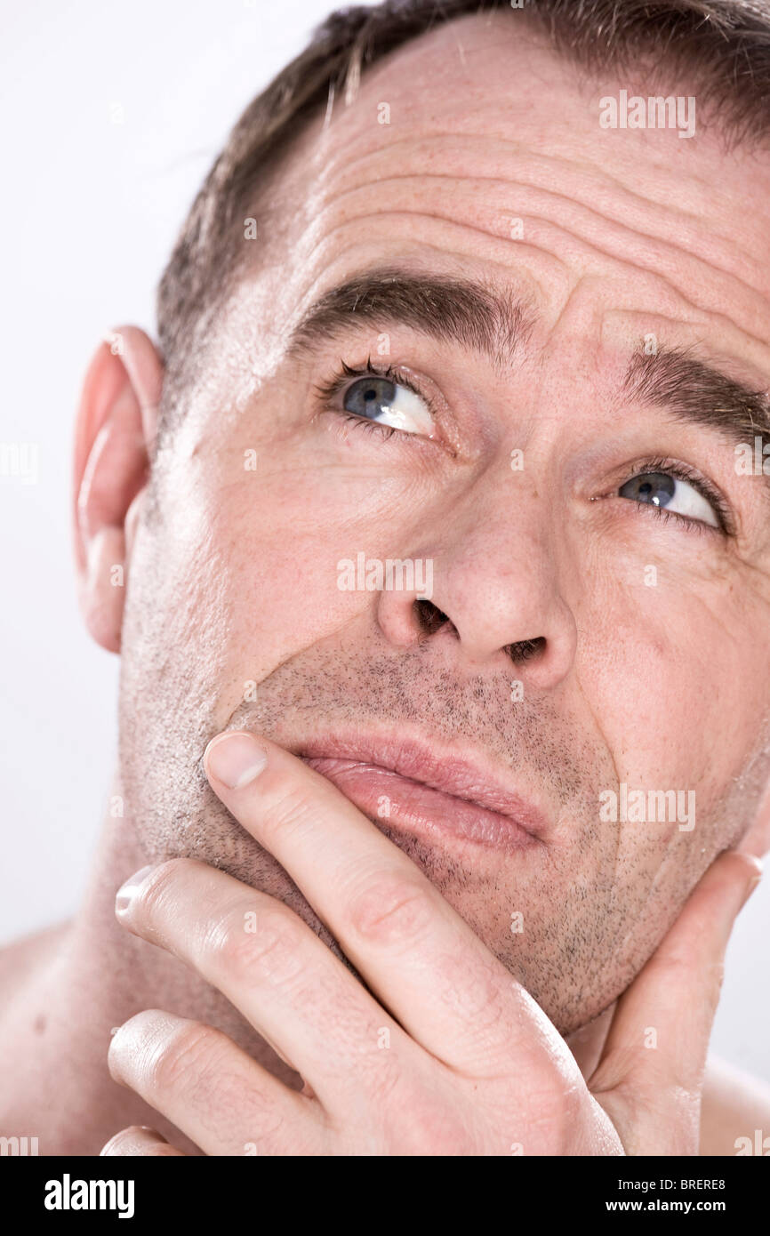 Portrait of a pensive man Stock Photo - Alamy