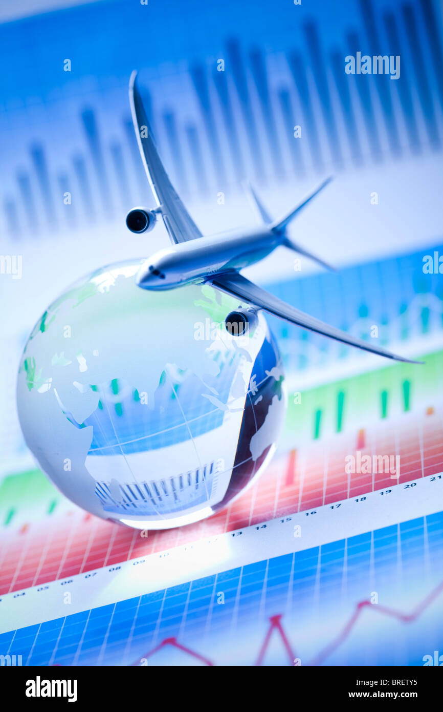Airplane in finance and world Stock Photo - Alamy