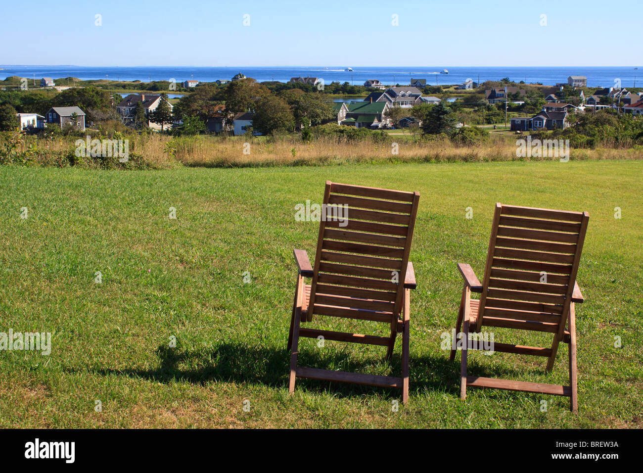 two chairs overlooking a ocean view Stock Photo - Alamy