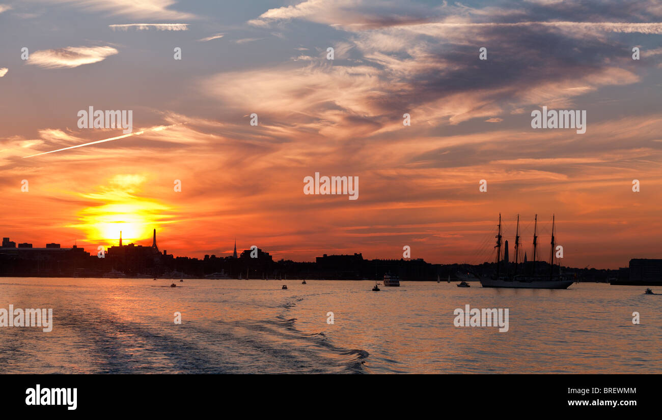 Boston Harbor Sunset. The sun sets over Boston and her famous Leonard P ...