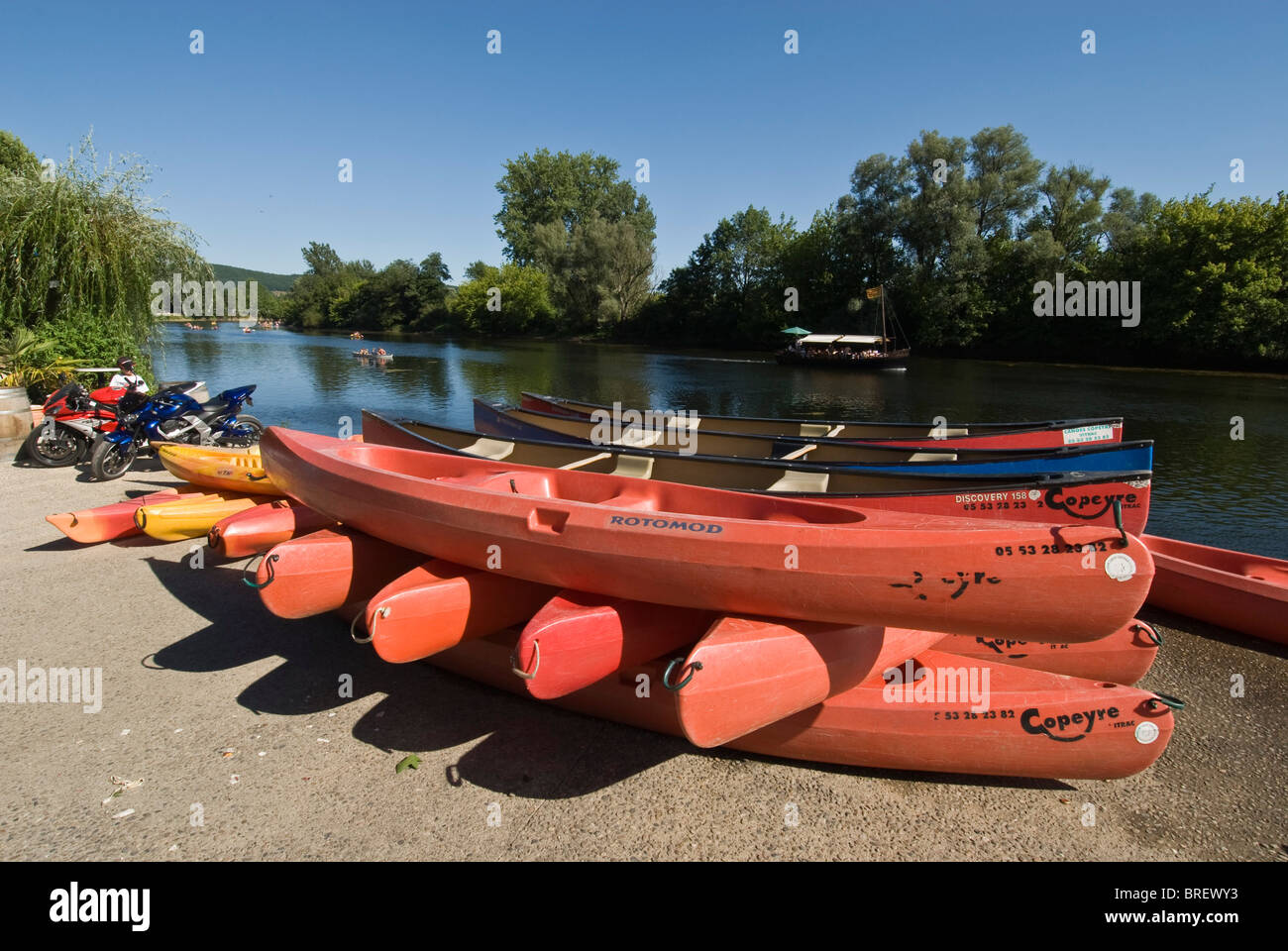 Canoes piled up at beynac et cazenac hi-res stock photography and ...