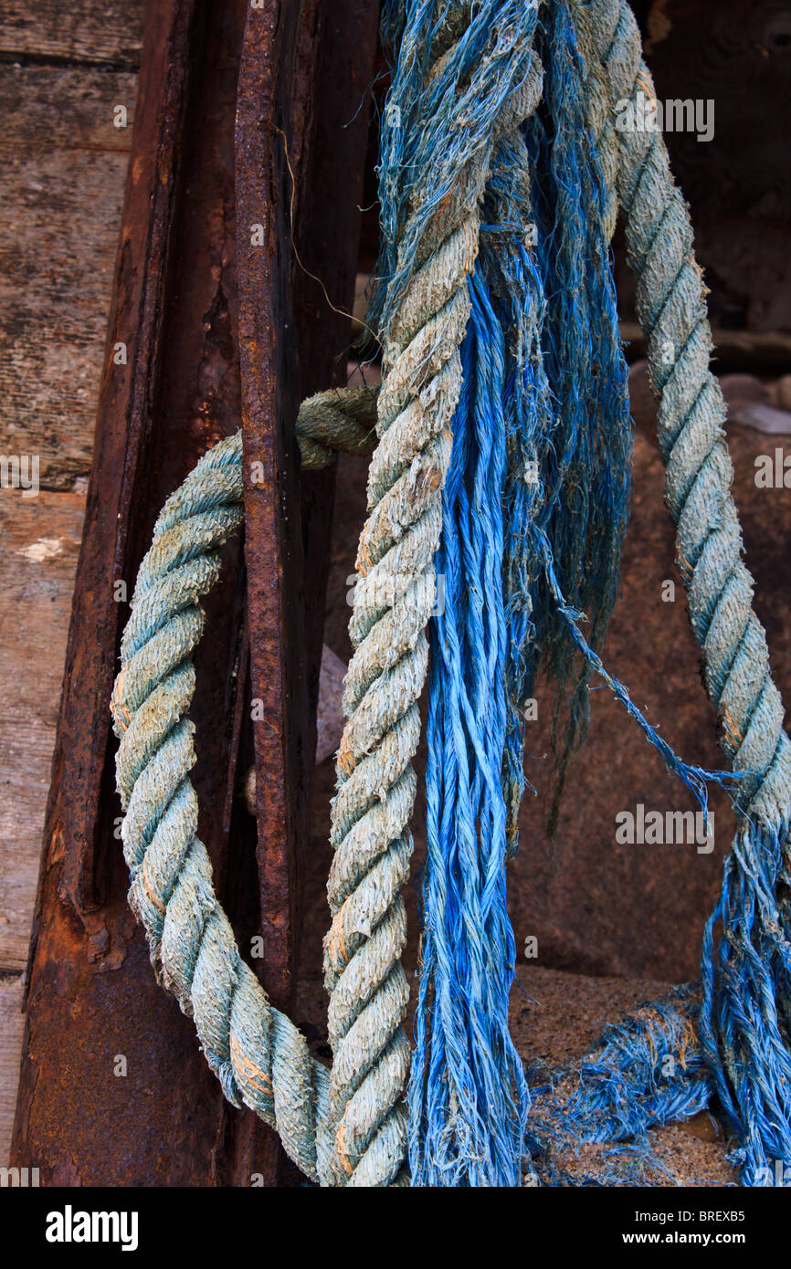 old blue rope hanging from shipwreck Stock Photo - Alamy