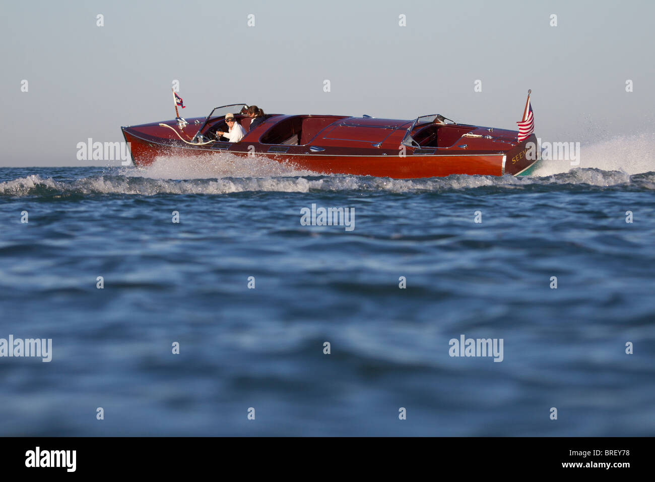 An antique, wooden Gar Wood boat in a high speed turn Stock Photo - Alamy