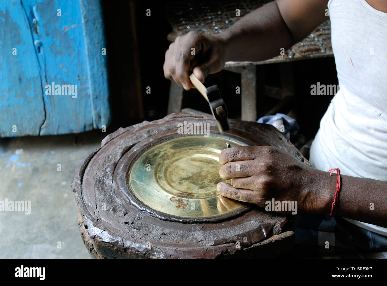 An Artisan making Tanjore art plate Brass metal plate ; Thanjavur ...