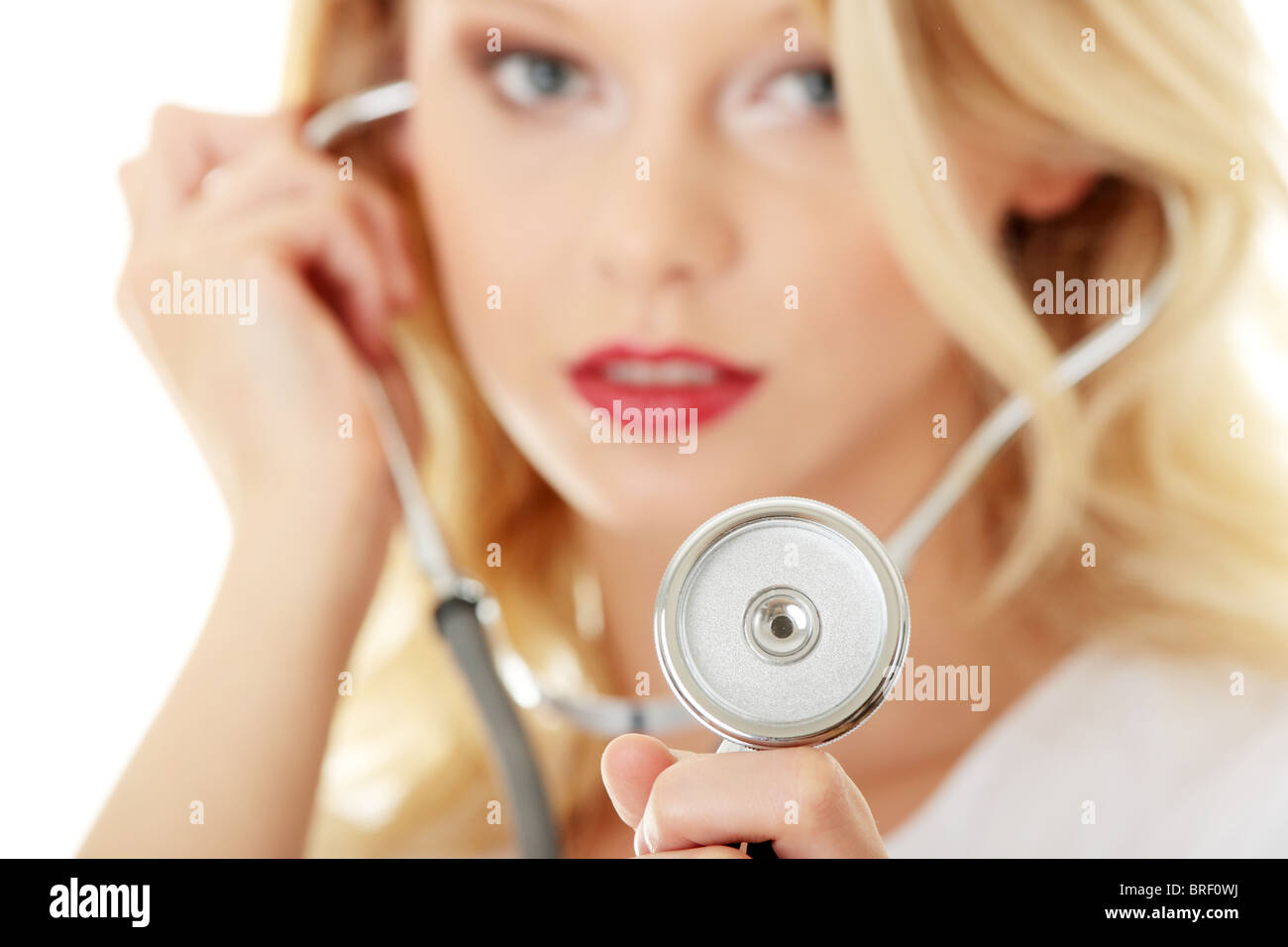 Female doctor with stethoscope, isolated on white Stock Photo - Alamy