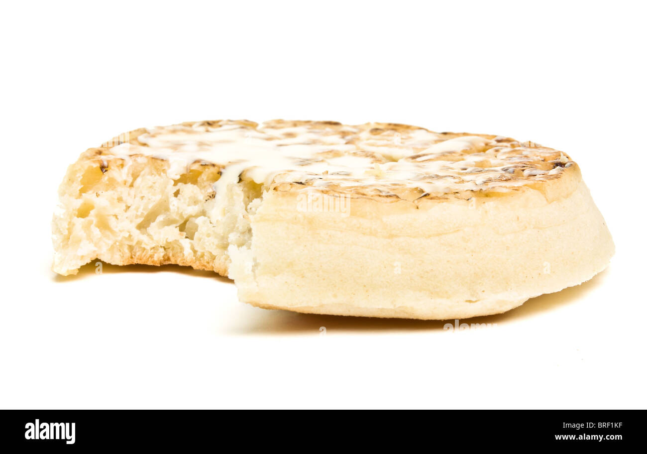 Traditional English Hot Buttered Crumpet with melting butter Stock ...
