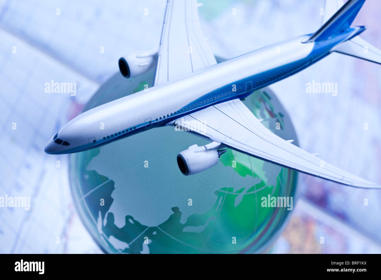 Airplane in finance and world Stock Photo - Alamy