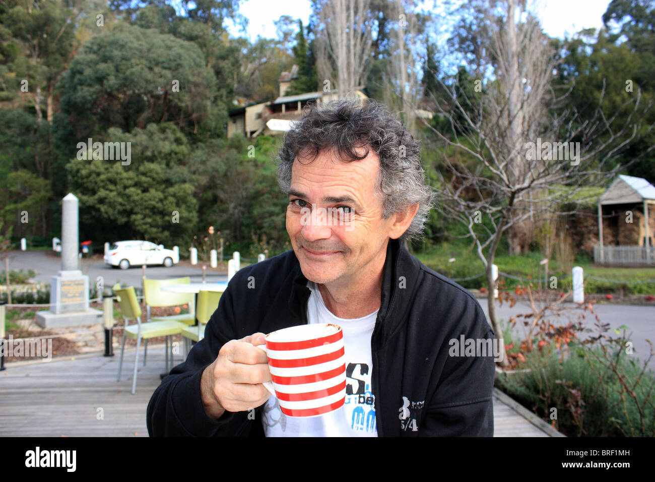 56 YEAR OLD MAN ENJOYING A CUP OF COFFEE BDA Stock Photo - Alamy