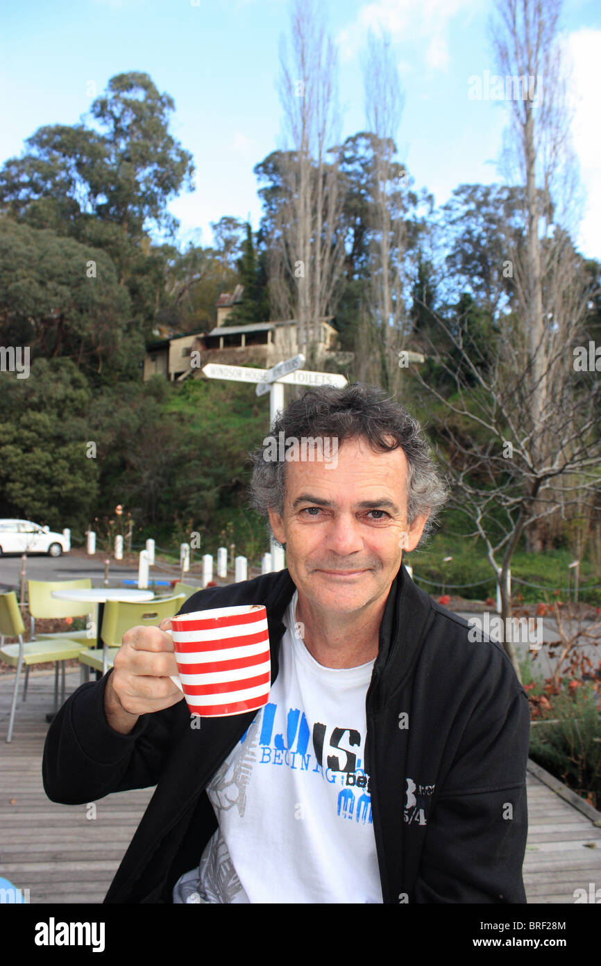 56 YEAR OLD MAN ENJOYING A CUP OF COFFEE BDA Stock Photo - Alamy