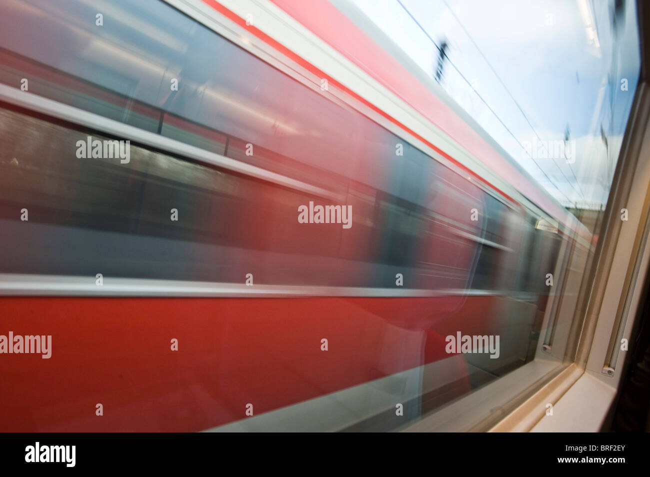 Train passing by Stock Photo - Alamy
