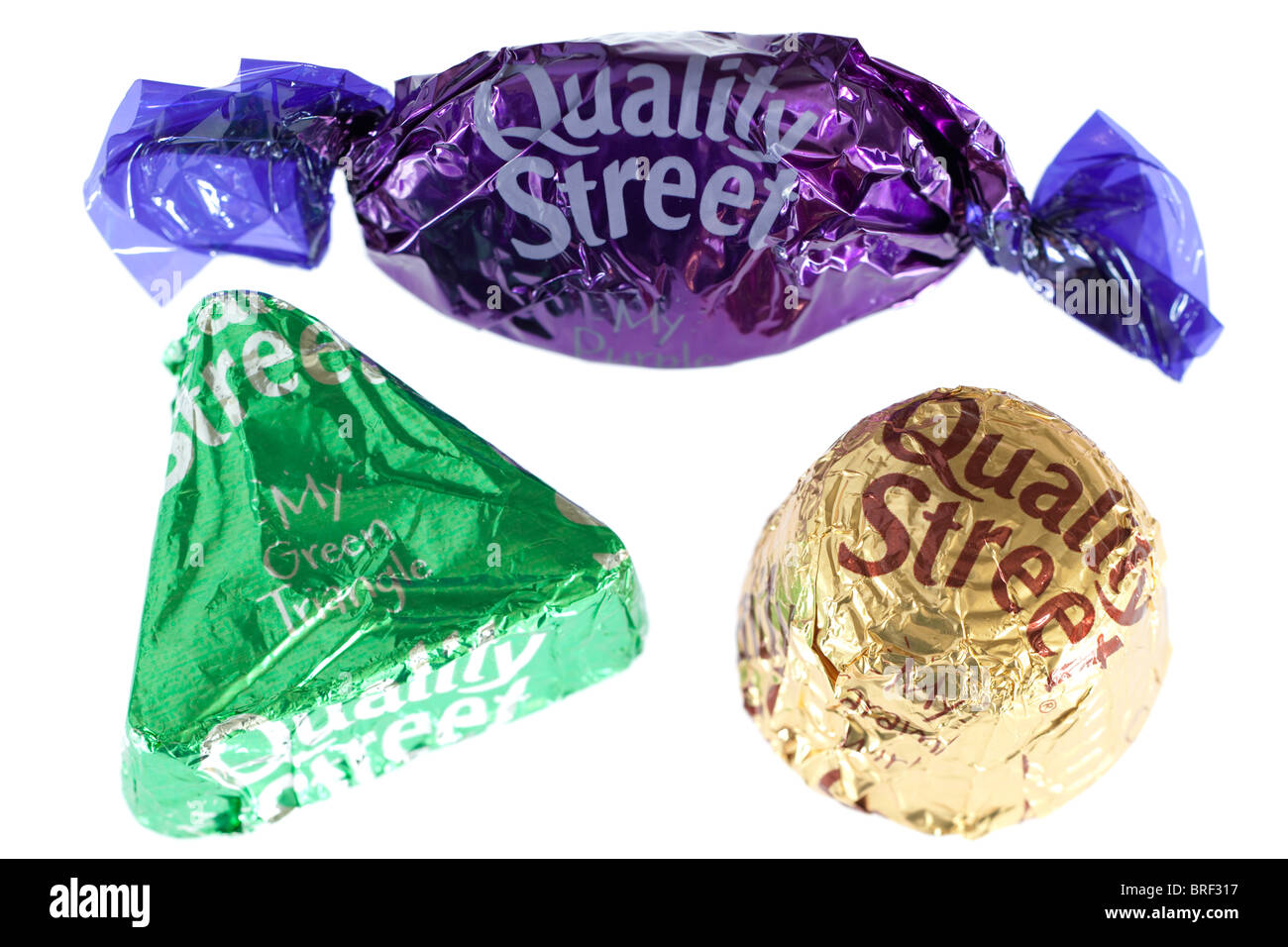 Three Quality Street wrapped chocolates My Purple My Green Triangle and ...