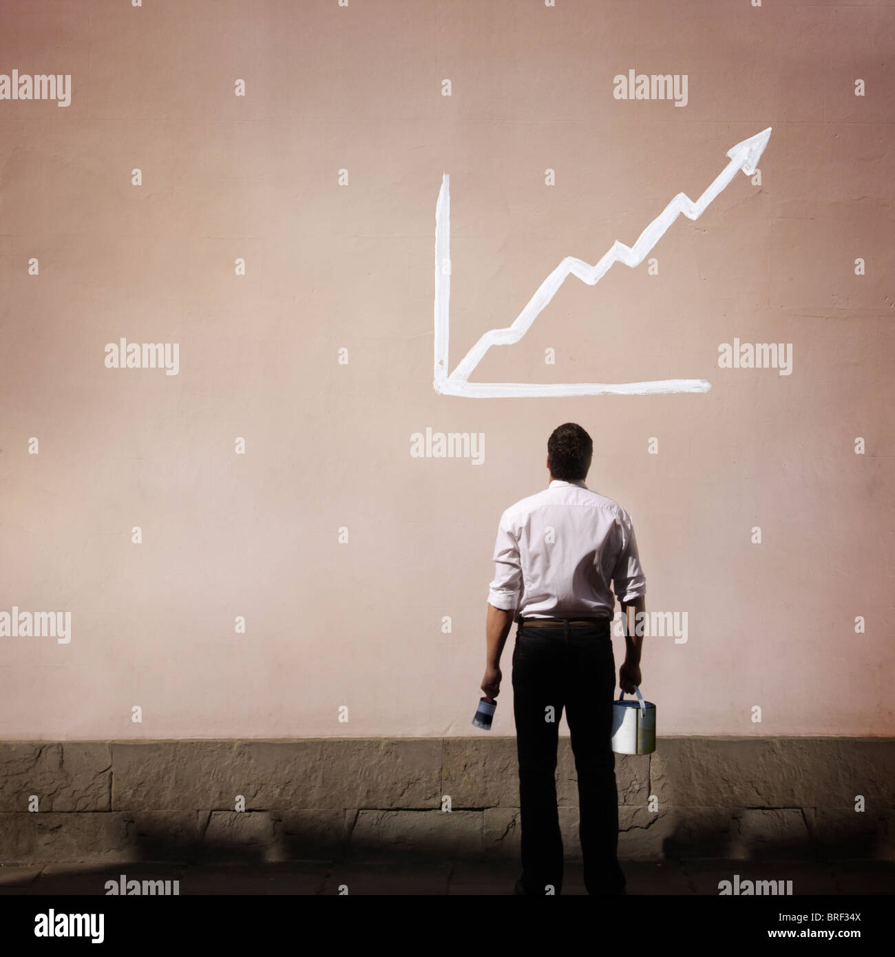 man with graph painted on wall Stock Photo - Alamy