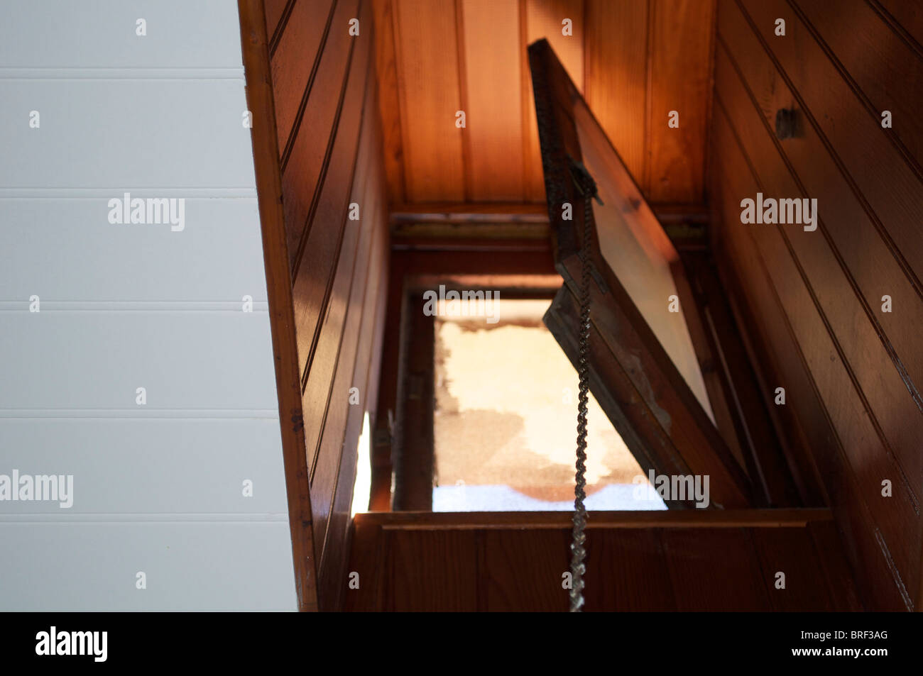 Open skylight with chain attachment Stock Photo - Alamy