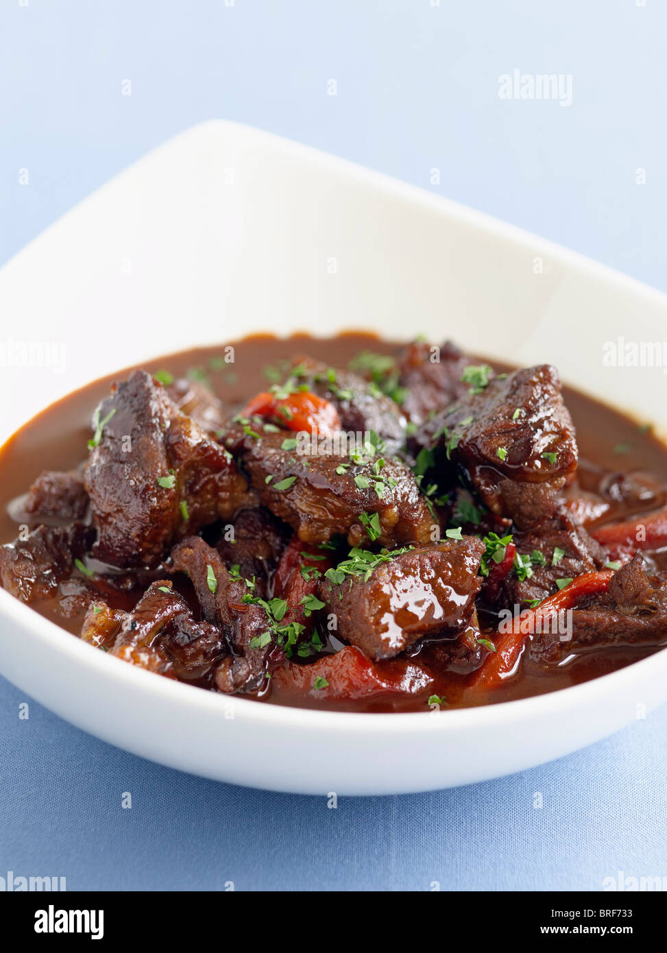 Spanish lamb and roasted pepper ragout Stock Photo - Alamy