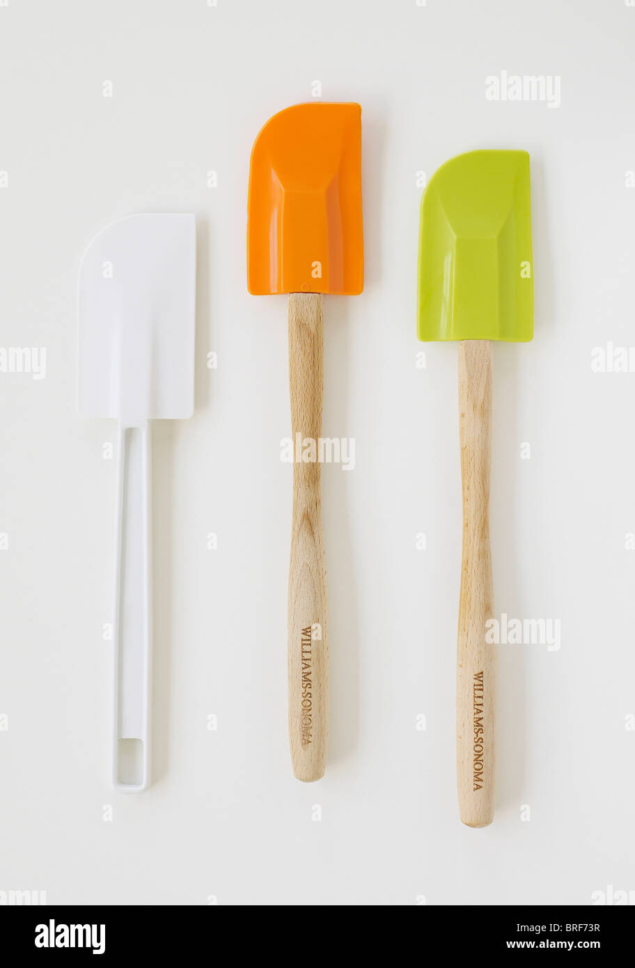 Three spatulas on white background, close-up Stock Photo - Alamy
