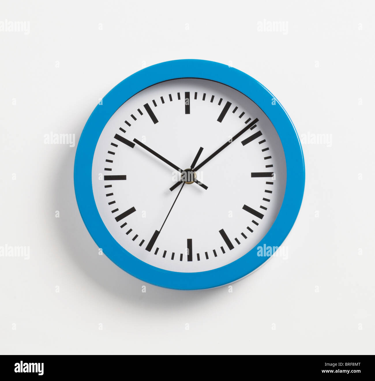 Clock on white background, close-up Stock Photo - Alamy