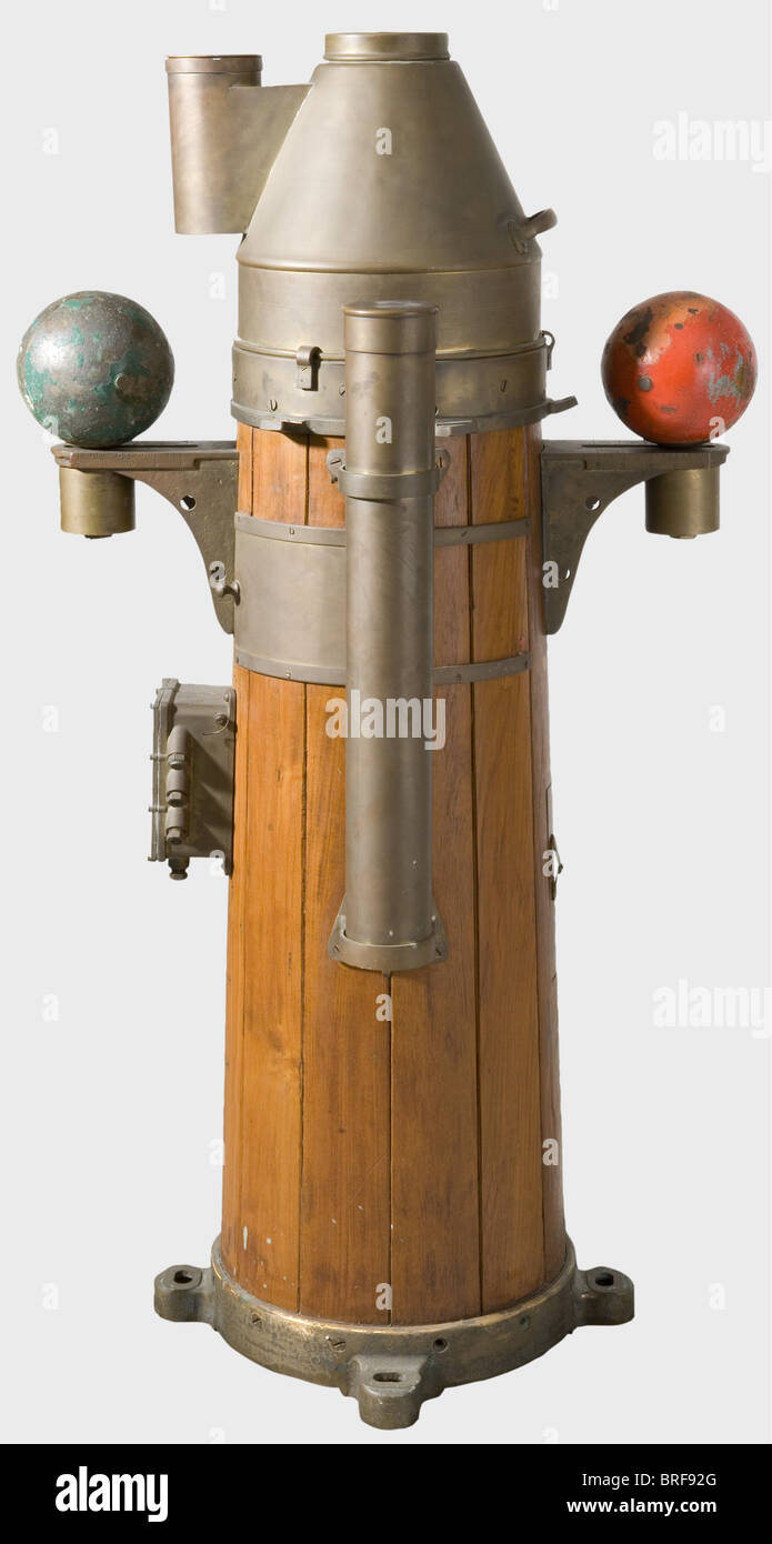 A compass, from the tugboat H.M.S "Reward". A wooden, gimbal mounted ...