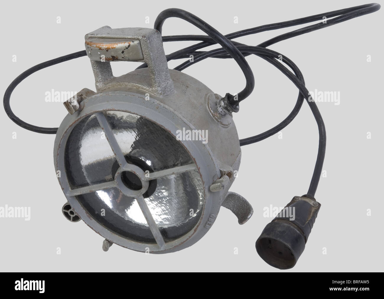 A Zeiss signal lantern of the Kriegsmarine, in light grey metal, with ...