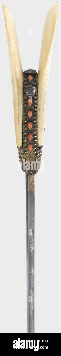 A yatagan with a European sword blade, circa 1830. A triangular sword ...
